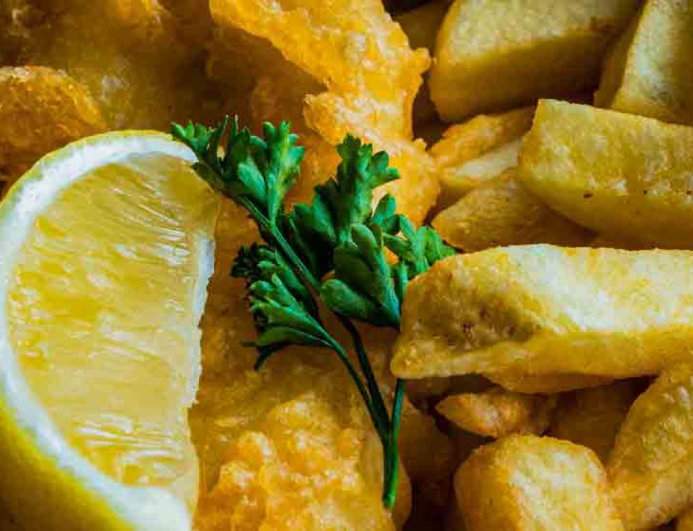 Baked Pollock with Tomatoes and Feta - Walter Purkis and Sons
